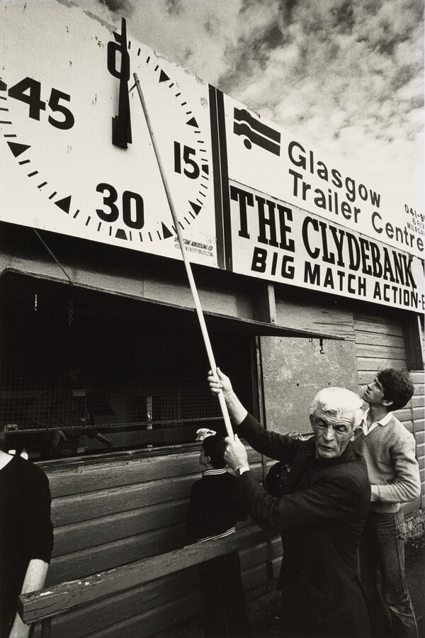 Clydebank Football Ground, Man resetting the Timing Clock by Malcolm ...