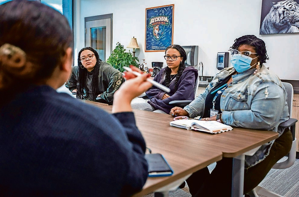 Emma Dayo (left) discusses ideas for upcoming events involving the ...