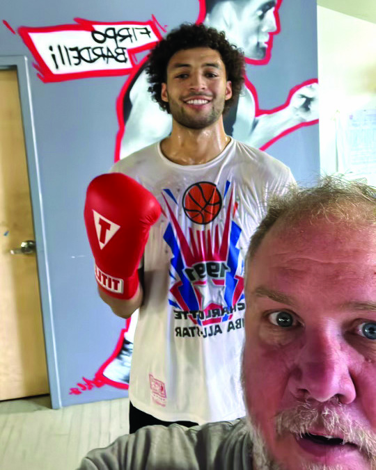 gonzaga forward anton watson poses with trainer rick welliver at ...
