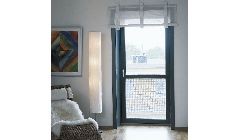 Alu Clad Timber Inward Opening Patio Doors by Janex