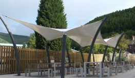 The Hartfield Tensile Fabric Hypar Walkway Canopy by Clovis Canopies